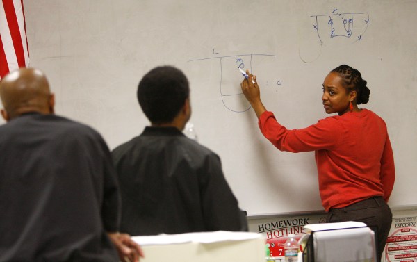 InFini Robinson leads referee crew during high school basketball game ...
