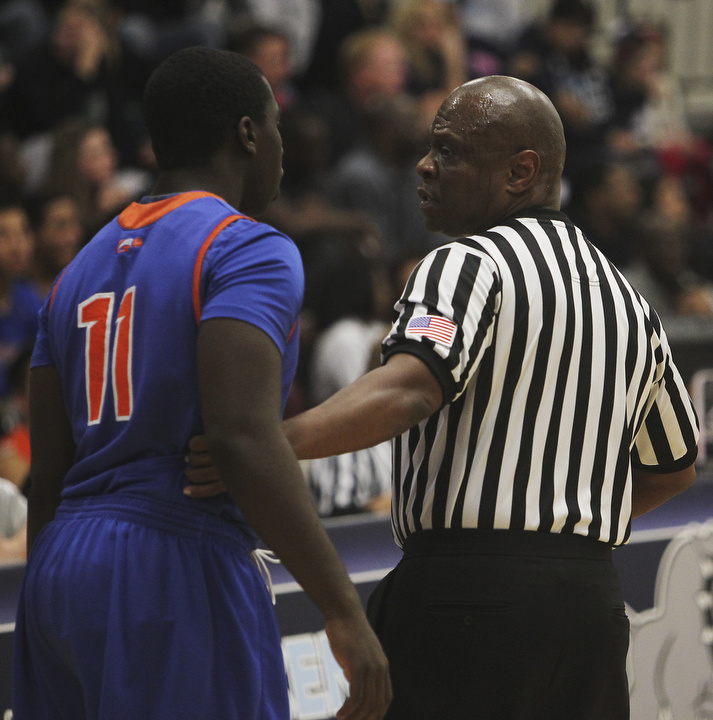 InFini Robinson leads referee crew during high school basketball game ...