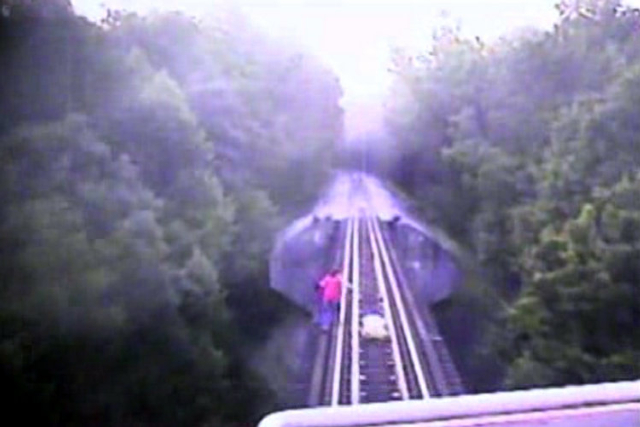 Video captures train narrowly missing two women on bridge | Uncategorized