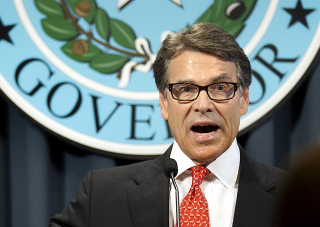Texas Gov. Rick Perry booked on abuse of power charges | Las Vegas ...