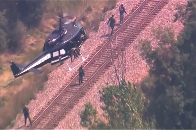 Manhunt continues for 3 suspects in Illinois officer’s shooting death ...