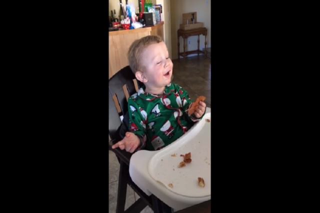 This baby has the best response to tasting bacon for the first time ...