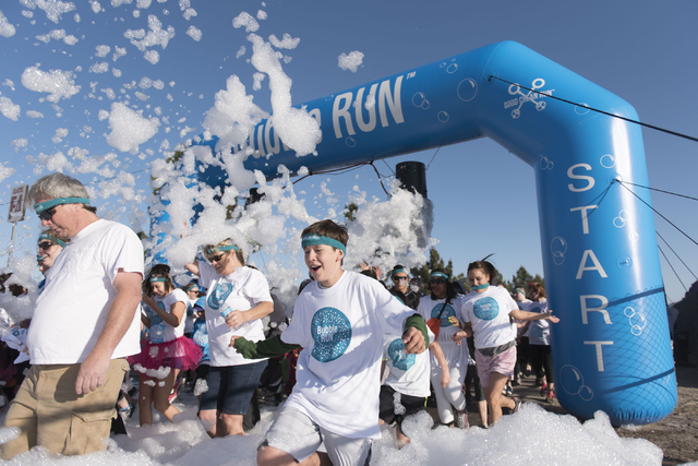 Runners find frothy, foamy fun at annual Bubble Run 5K in Las Vegas — PHOTOS | Las Vegas Review ...