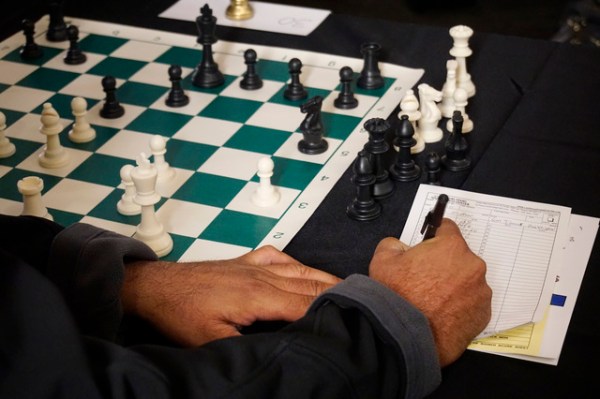A player records his latest move against Timur Gareyev, a chess ...