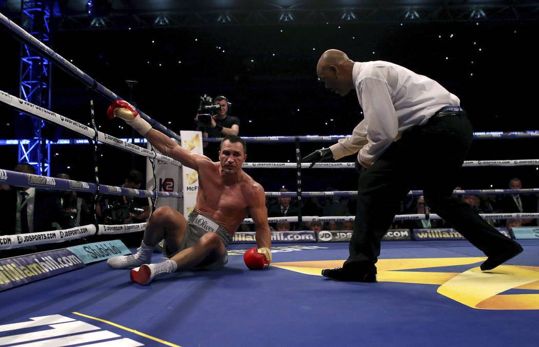British heavyweight boxing star Joshua knocks out Klitschko in London ...