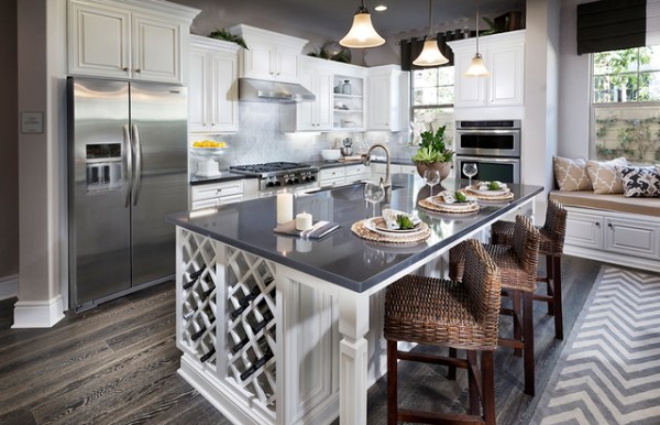 A Pulte model home’s kitchen has upgraded appliances. (COURTESY OF ...
