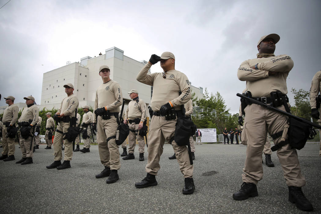 Troopers with the Florida Highway Patrol Quick Response Force line in ...