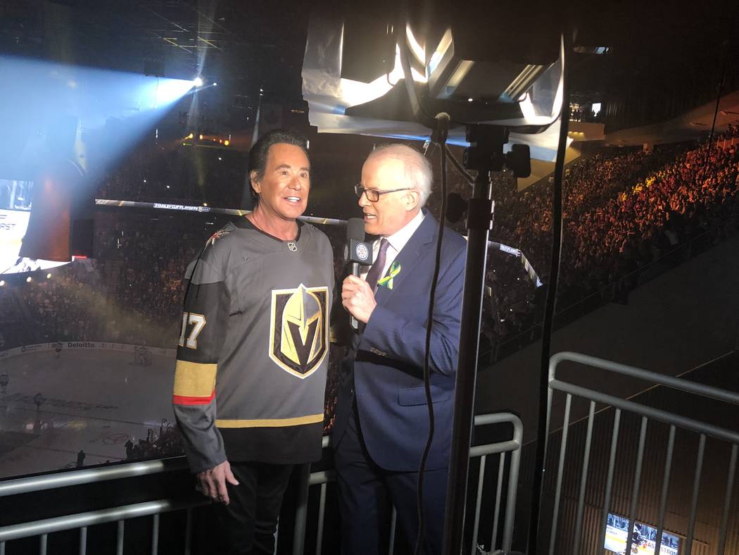 Wayne Newton is shown being interviewed by CBC’s “Hockey Night in ...