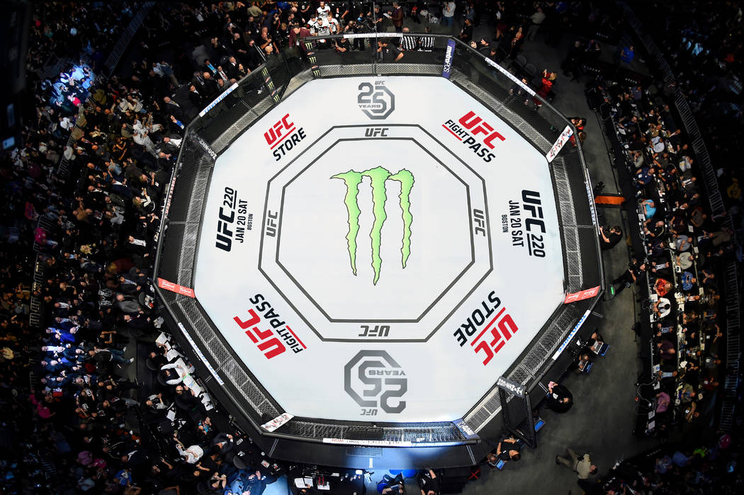 An example of the UFC’s 25th anniversary canvas, including its new logo ...
