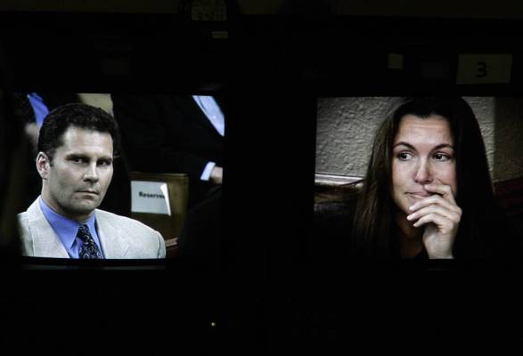 Rick Tabish and Sandy Murphy are shown on television monitors in court ...