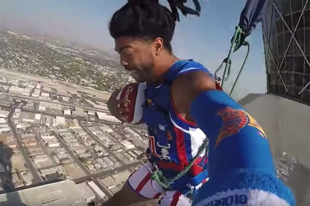 Harlem Globetrotter makes world’s highest slam dunk in Las Vegas ...