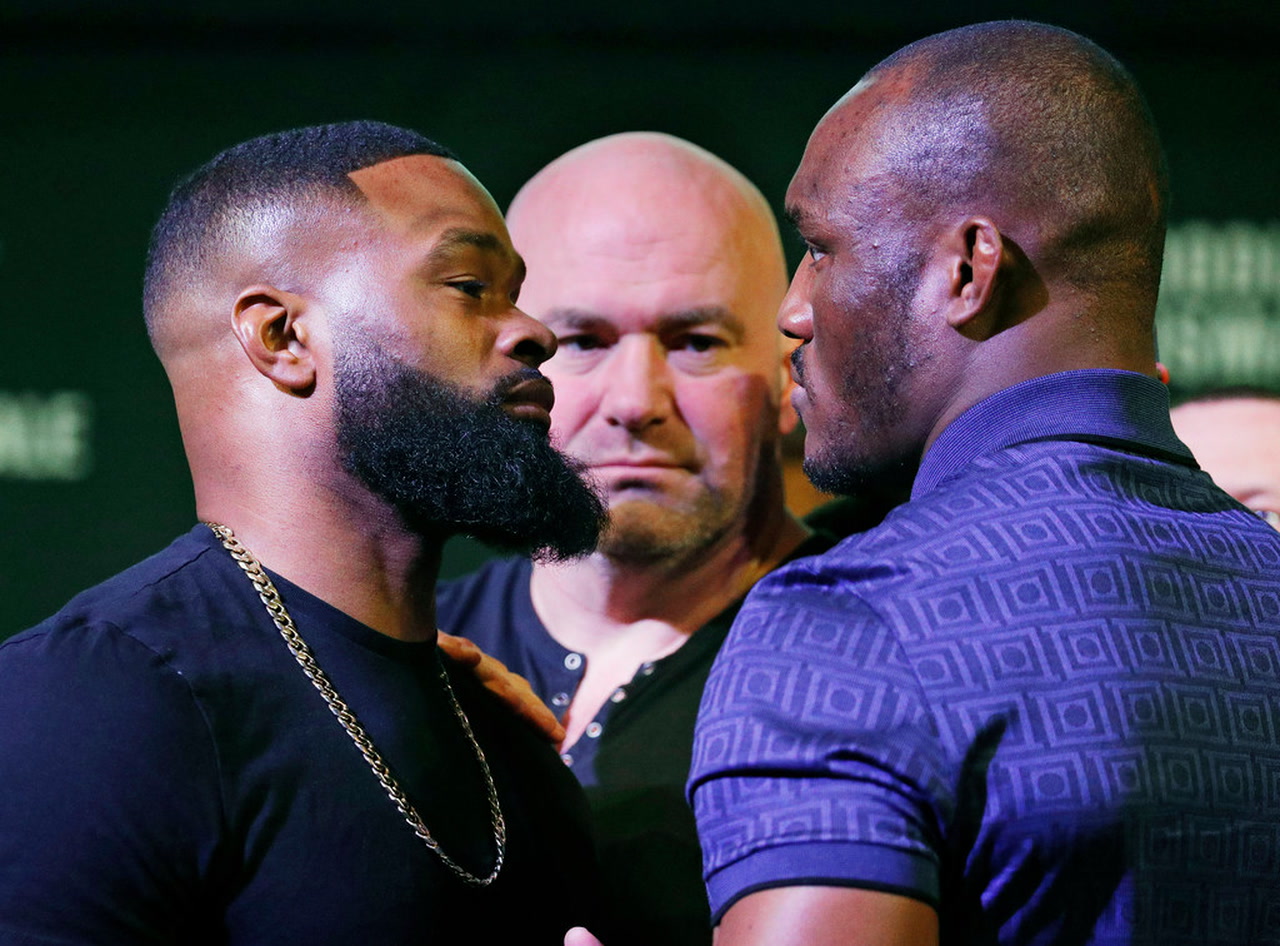 Tyron Woodley, Kamaru Usman mix it up at UFC 235 news conference ...