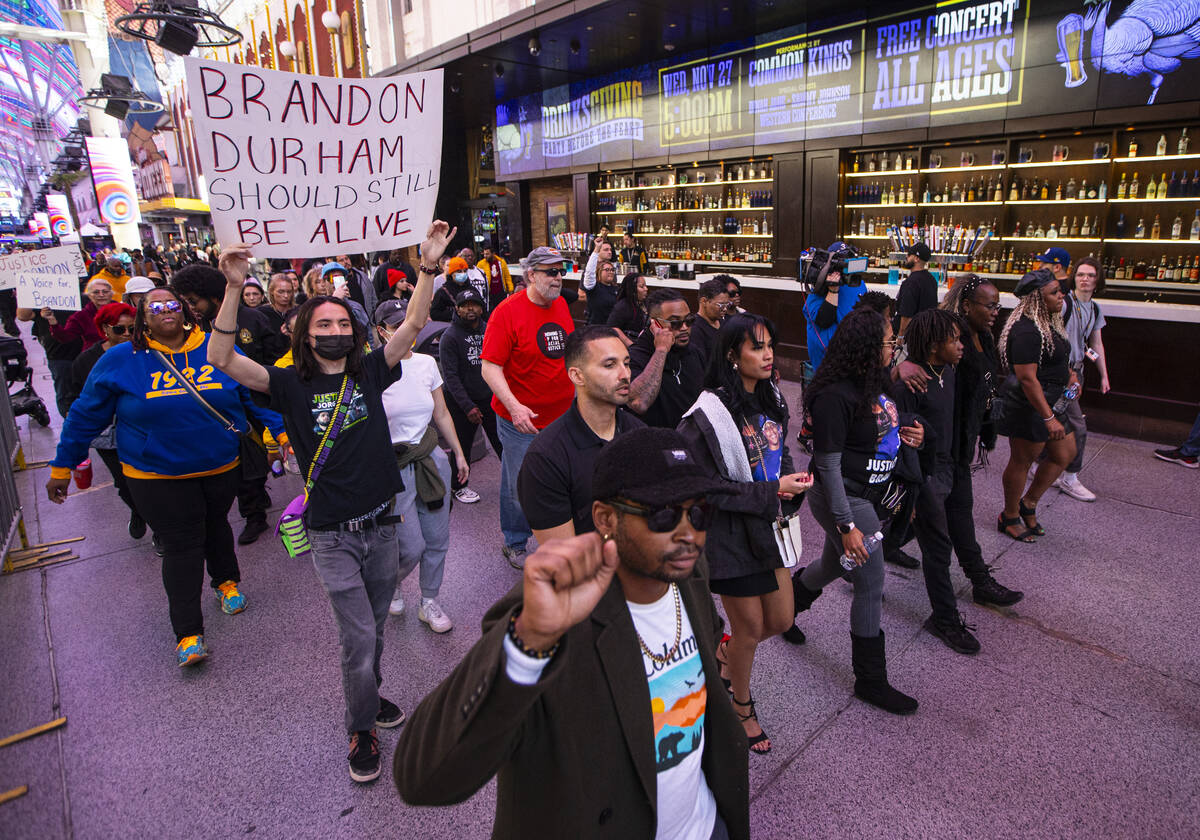 Hundreds march in Las Vegas to honor of Brandon Durham, who was shot by ...