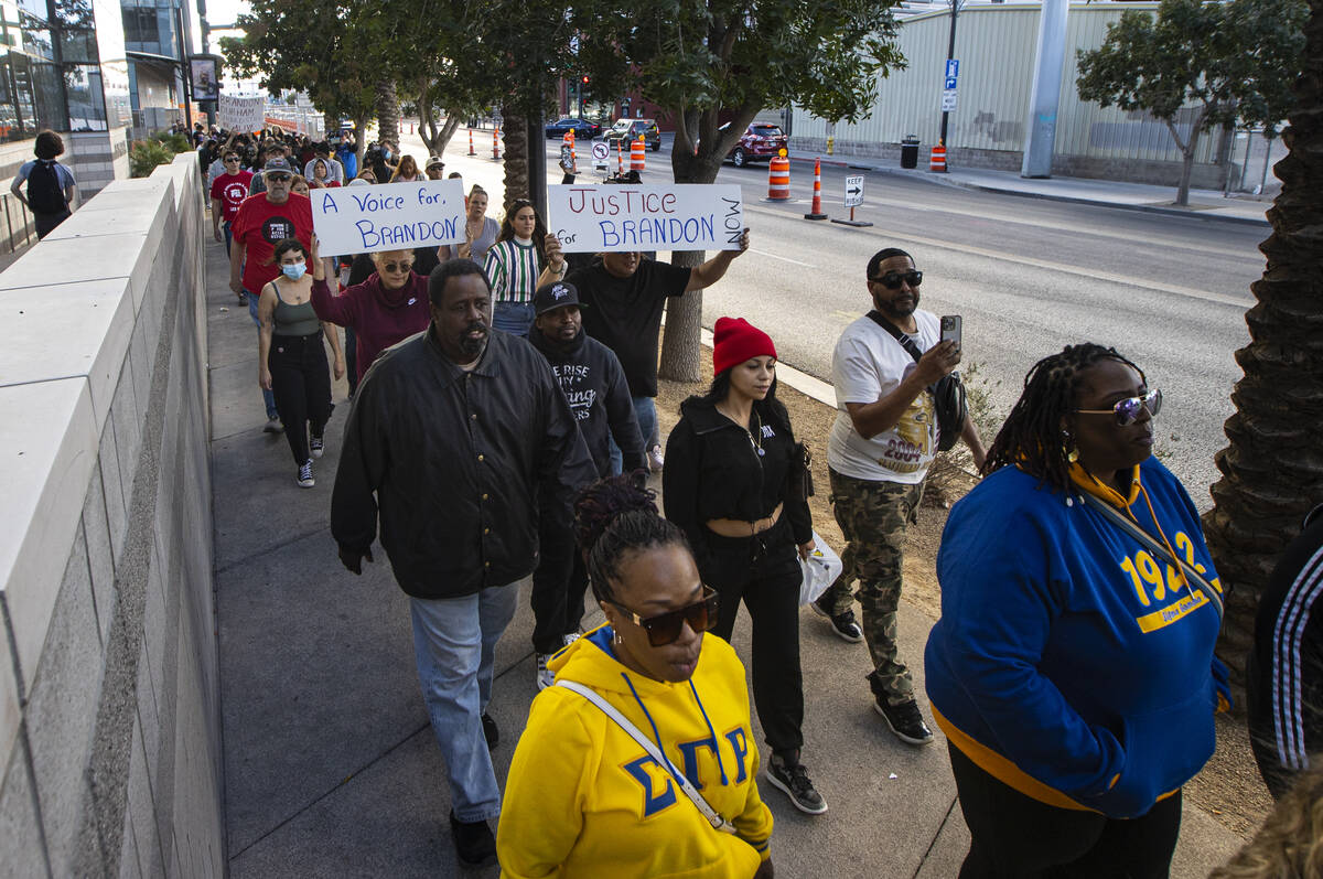 Hundreds march in Las Vegas to honor of Brandon Durham, who was shot by ...