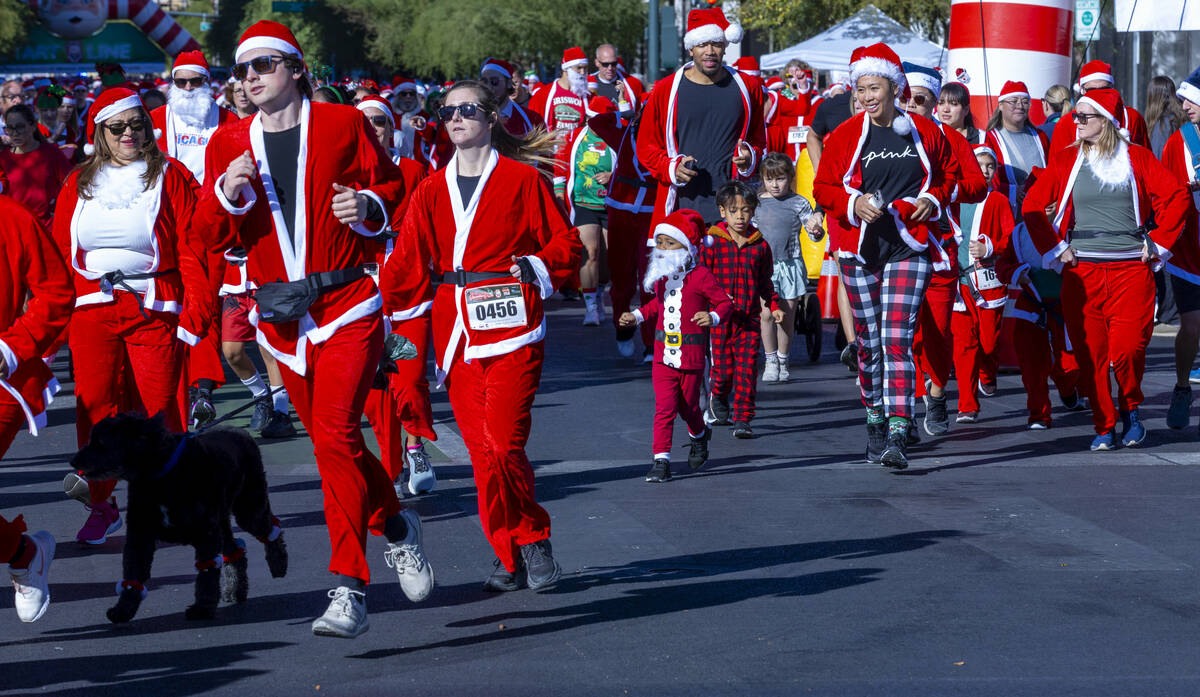 Thousands of Santas run in downtown Las Vegas to raise money for ...
