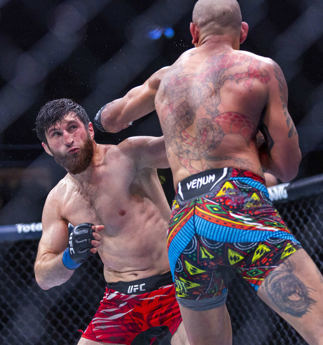 UFC 313 results: Magomed Ankalaev beats Alex Pereira; Justin Gaethje ...